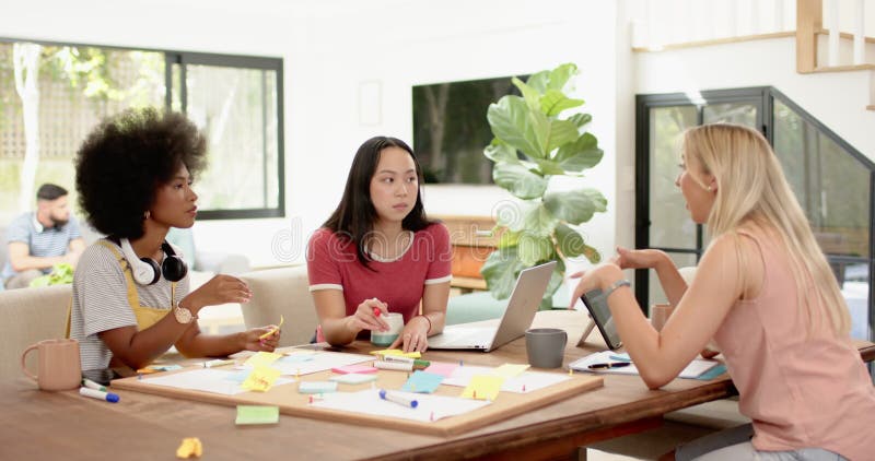 Collaborating on Project, Young Diverse Friends Using Laptop and Sticky ...