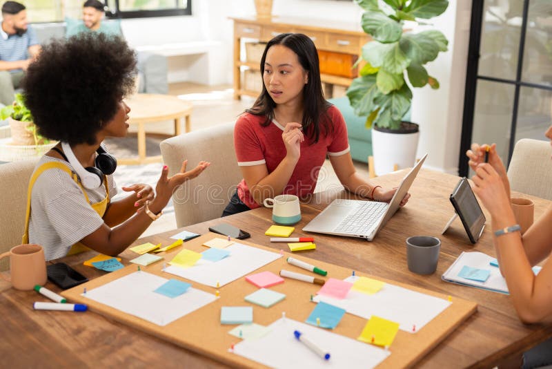 Collaborating on Project, Young Friends Using Laptop and Sticky Notes ...