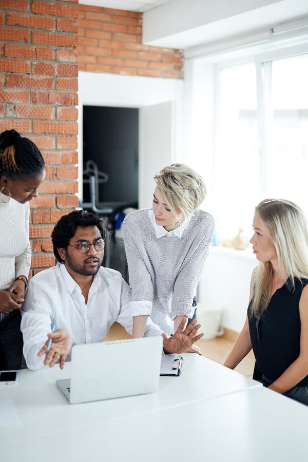 Collaborating Serious People at Work Stock Photo - Image of five ...