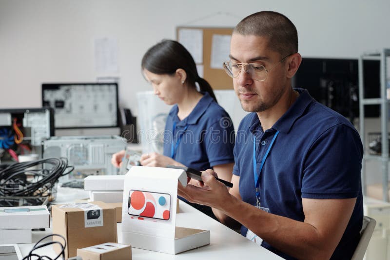 Collaborating on Technology Projects in Office Setting Stock Photo ...