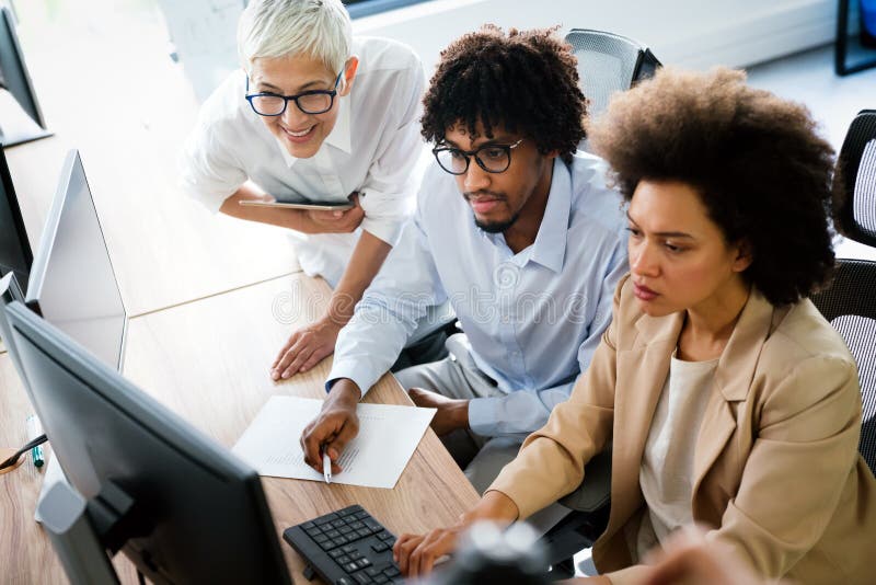 Collaboration and Analysis by Business People Working in Office Stock ...