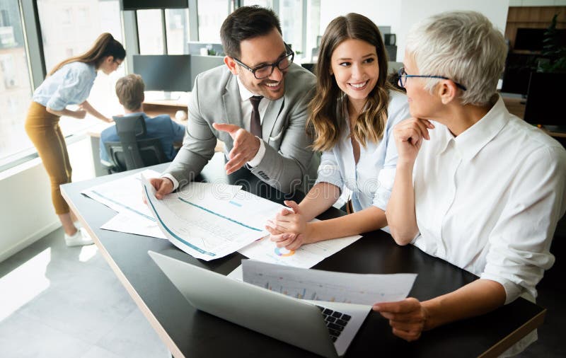 Collaboration and Analysis by Business People Working in Office Stock ...