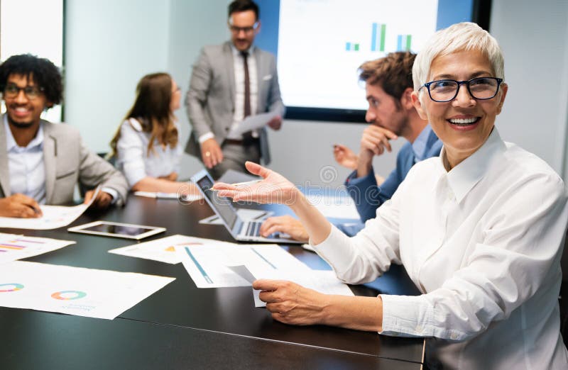 Collaboration and Analysis by Business People Working in Office Stock ...