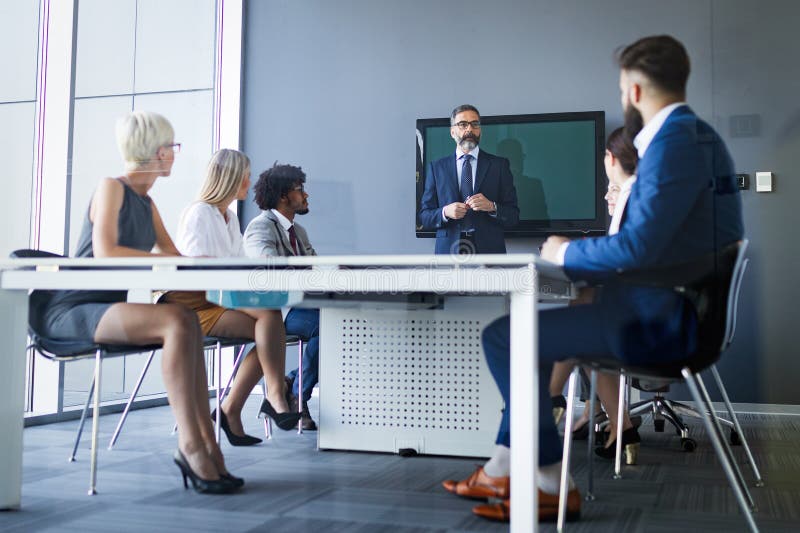 Collaboration and Analysis by Business People Working in Office Stock ...