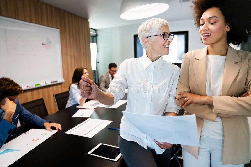 Collaboration and Analysis by Business People Working in Office Stock ...