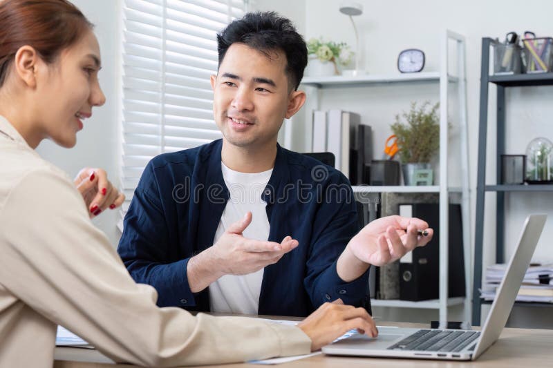 Collaboration and Communication. Two Colleagues Discussing Project ...