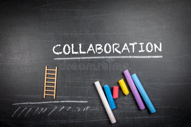 COLLABORATION Concept. Text and Colored Pieces of Chalk on a Blackboard ...