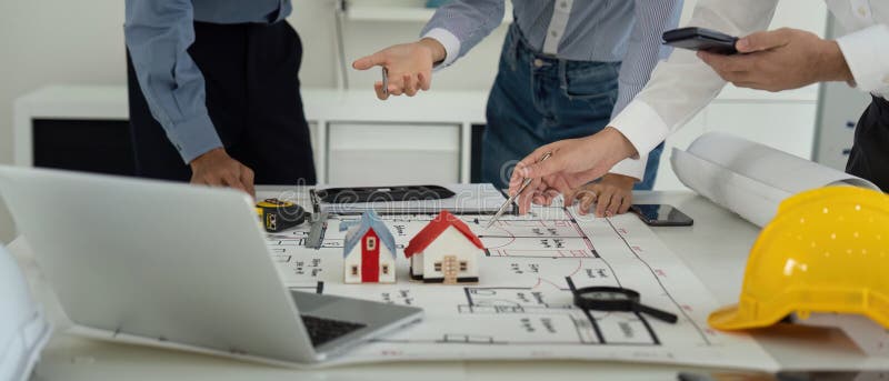 Collaboration and Construction Planning. Team Members Discussing ...