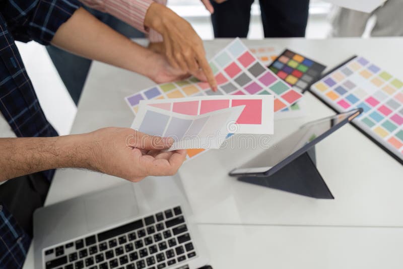 Collaboration and Creative Review. Diverse Team Discussing Color ...