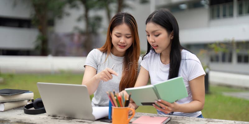 Collaboration and Learning. Two Friends Studying Together and Sharing ...