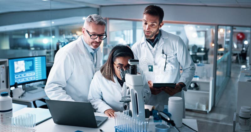 Collaboration, Microscope and Science with People in Lab Together for ...