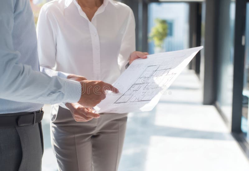 Collaboration in a Modern Office Space during a Project Discussion ...