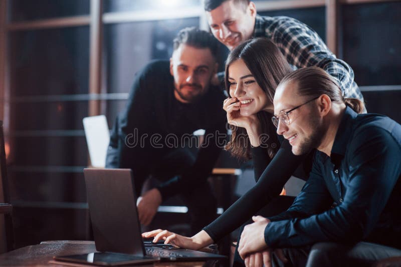 Collaboration of People. Team of Young People Works on Their Project at ...