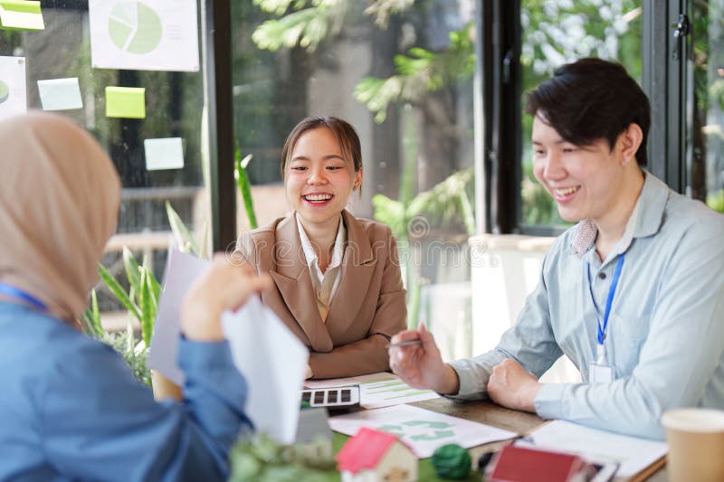 Collaboration and Sustainability. Professionals Discussing Sustainable ...