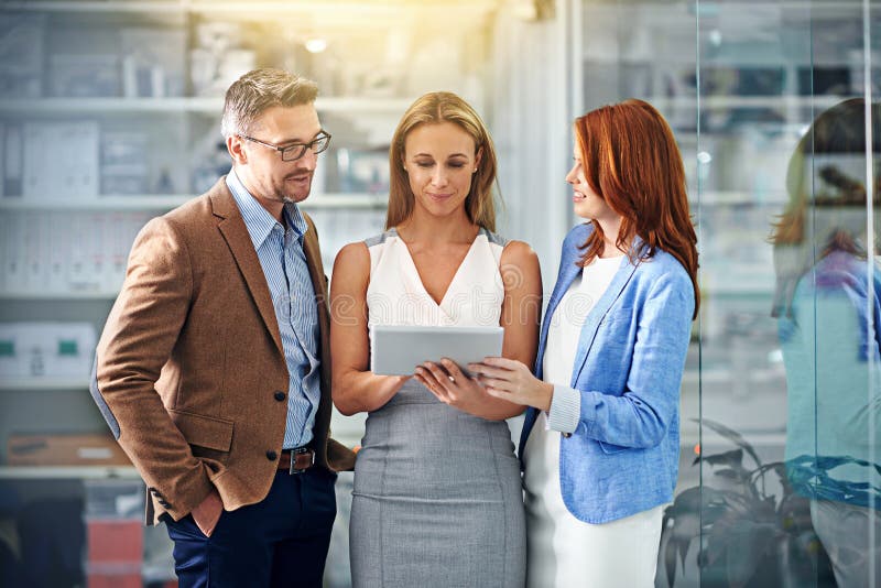 Collaboration, Tablet and Planning with a Business Team Doing Research ...