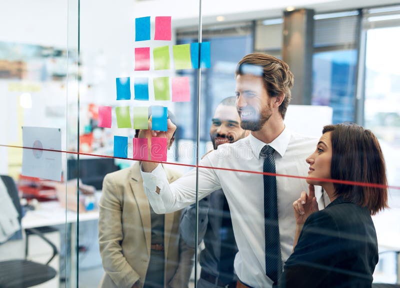 Collaboration, Team of Colleagues Working on Strategy and Schedule in ...