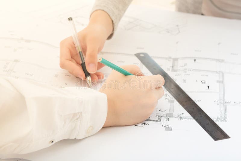 Collaboration, Teamwork. a Group of Engineers Discuss Architectural ...