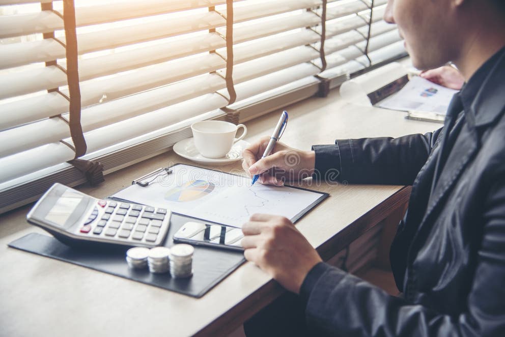 Collaboration Worker in Office Working Together with Excel Graph with ...