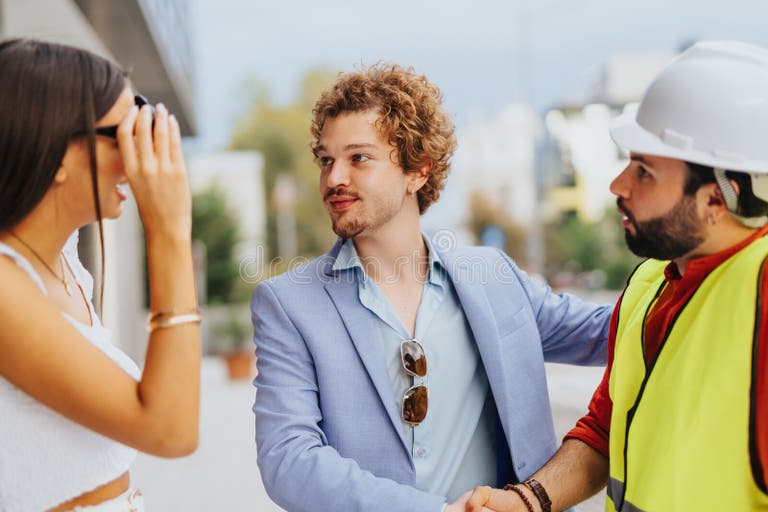 Collaborative Architectural Team Strategizing Sustainable Design and ...