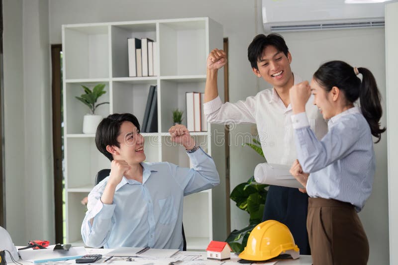 Team Collaboration and Celebration. Two Colleagues Celebrate Their ...