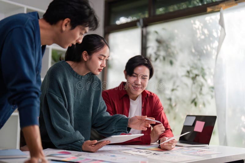 Collaborative Innovation in Design. a Team Brainstorming Ideas Around a ...