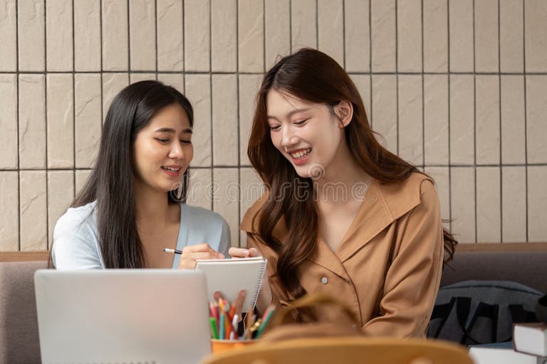 Collaborative Learning and Academic Growth. Two Friends Sharing Notes ...