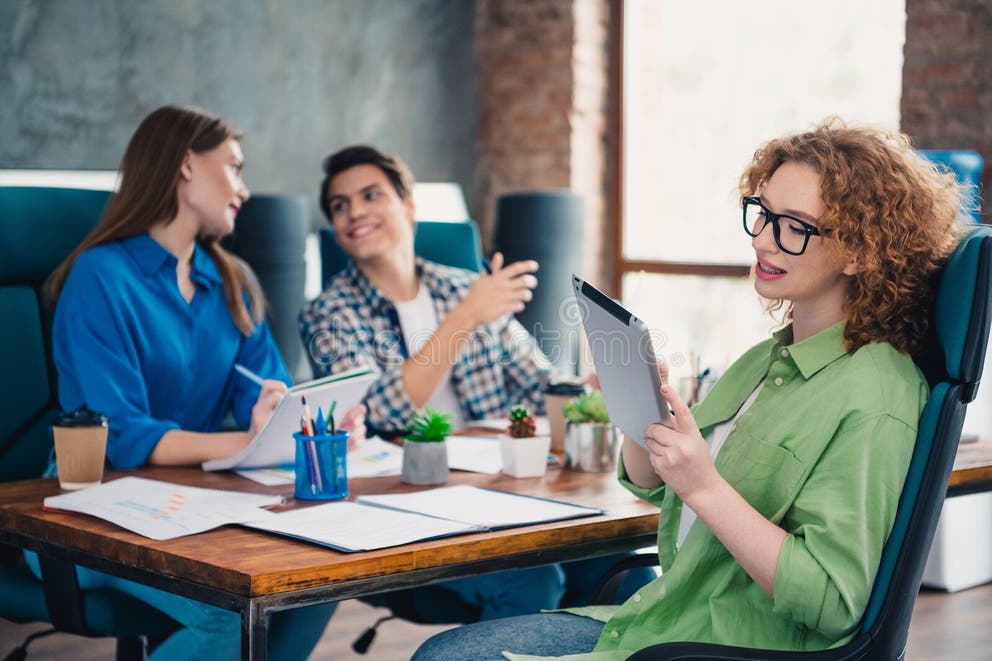Business Setting Featuring a Group of People Collaborating in an Office ...