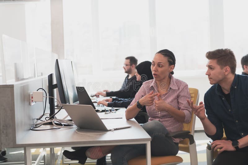 Collaborative Process of Multicultural Skilled Young Business Team ... Collaborative Process of Multicultural Skilled Young Business Team ...