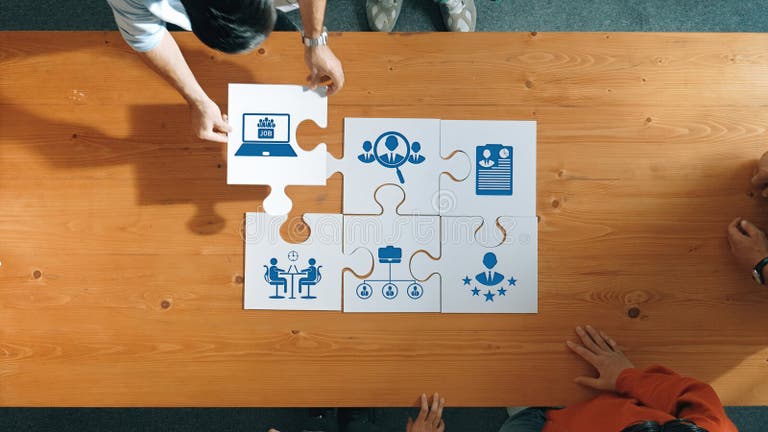 Collaborative Team Building Activity with Puzzle Pieces Representing ...
