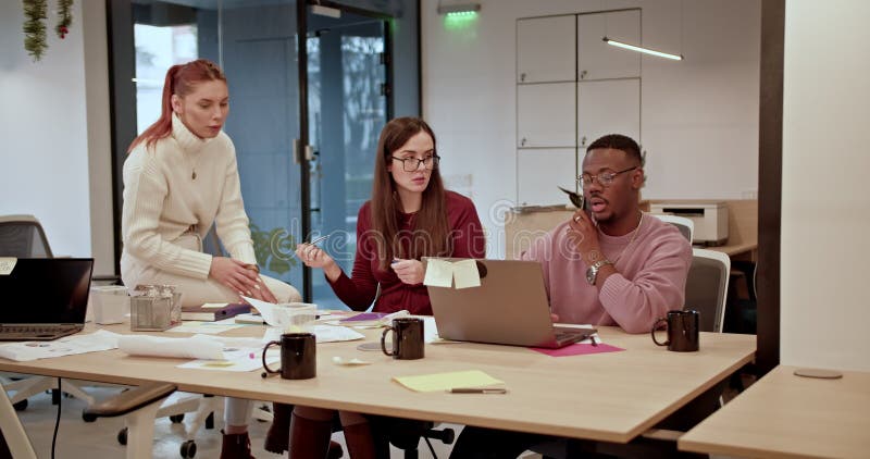 A Collaborative Team of Employees Analyzing and Strategizing for ...