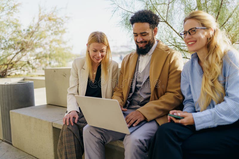 A Collaborative Team Meeting Organized Outdoors in a Modern Workplace ...