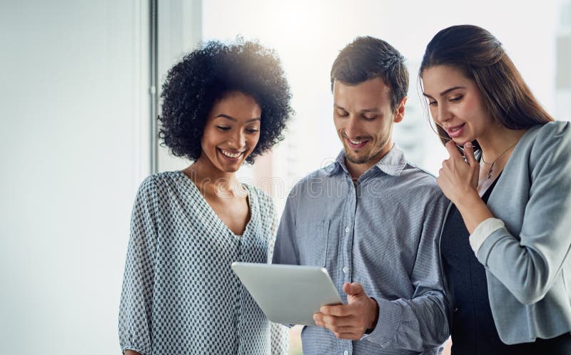 The Collaborative Team is a Productive Team. Shot of a Group of Young ...