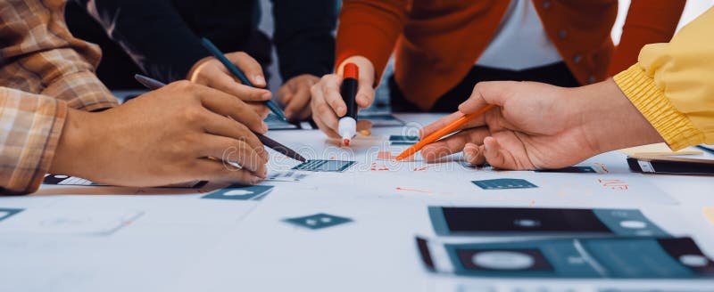 Collaborative Teamwork in Creative Workspace with Diverse Hands Engaged in Planning and ...