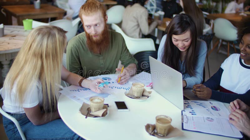Collaborative Teamwork in a Modern Caf Setting Stock Video - Video of ...