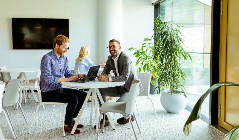 Collaborative Tech Exploration Stock Image - Image of coworkers ...