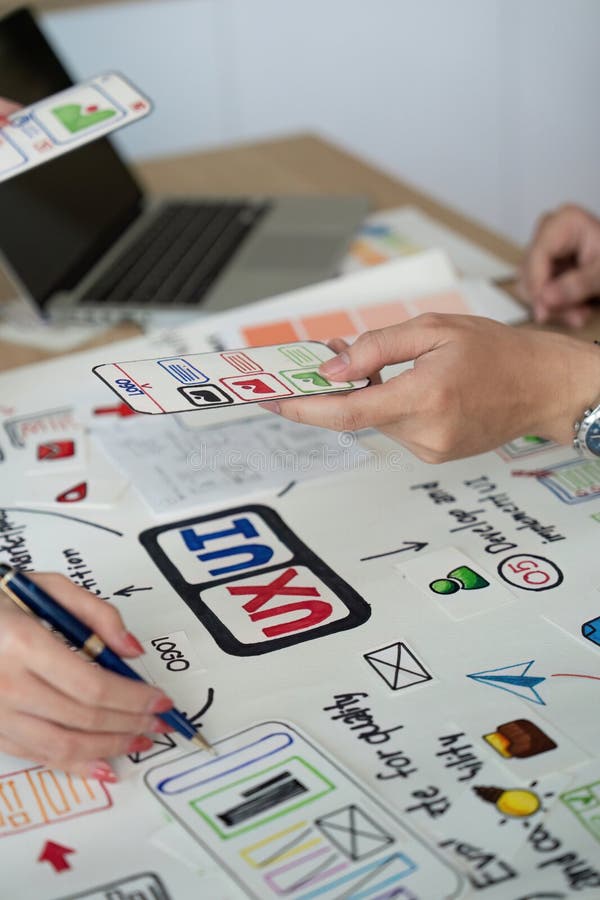 Collaborative UX UI Design Session. Team Members Sharing Design Ideas ...