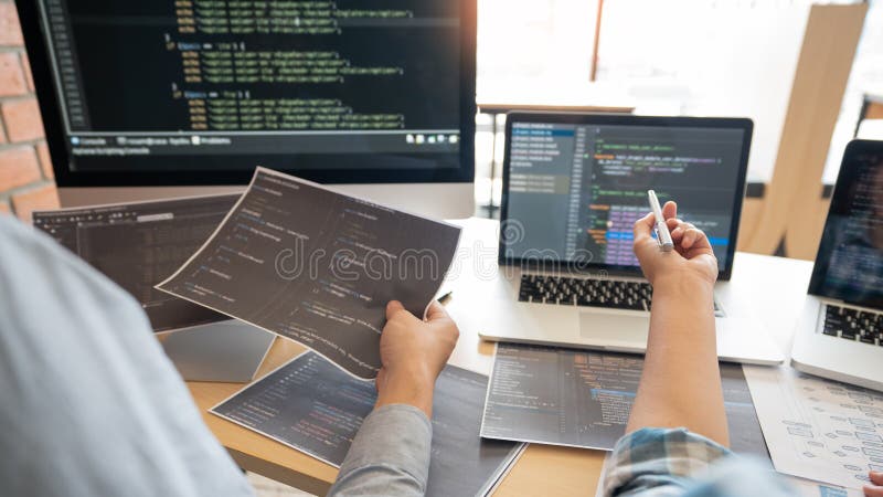 Programmer Working On Computer In It Office Typing Data Coding In Software And Checking Code On