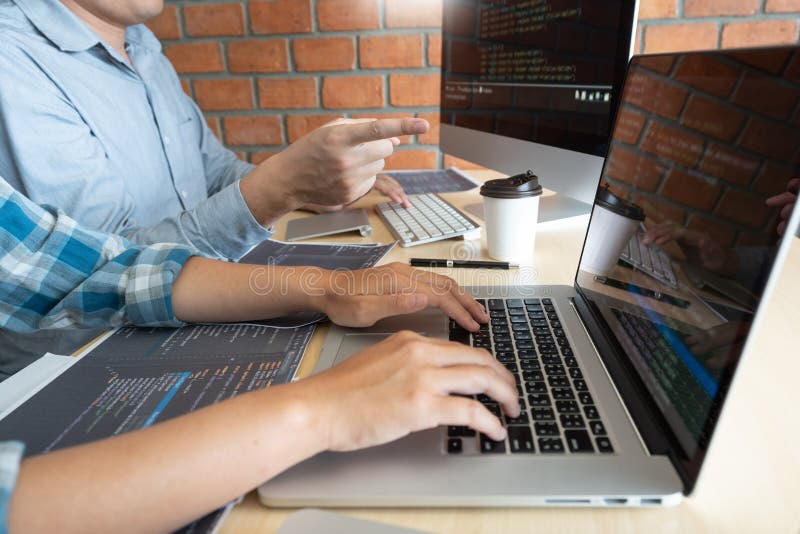 Programmer Working On Computer In It Office Typing Data Coding In Software And Checking Code On