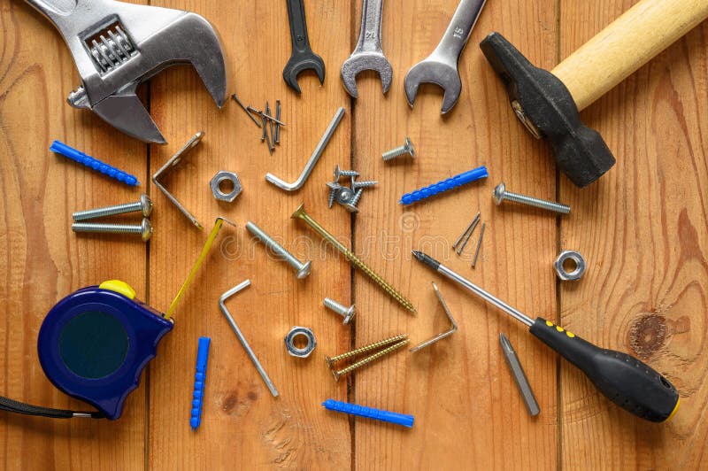 Collage of Building Tools for the House on a Wooden Background. Stock ...