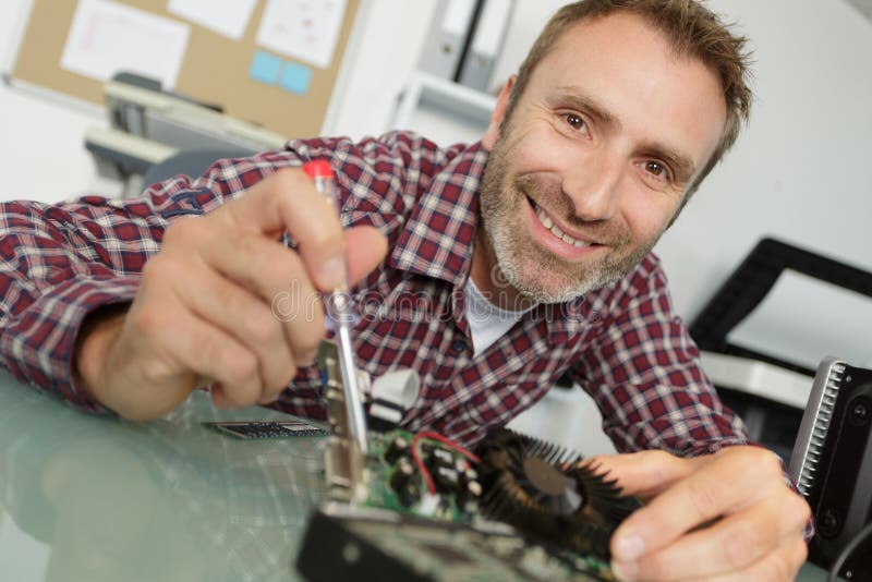 Collage Smiling Handsome Computer Technician at Work Stock Photo ...