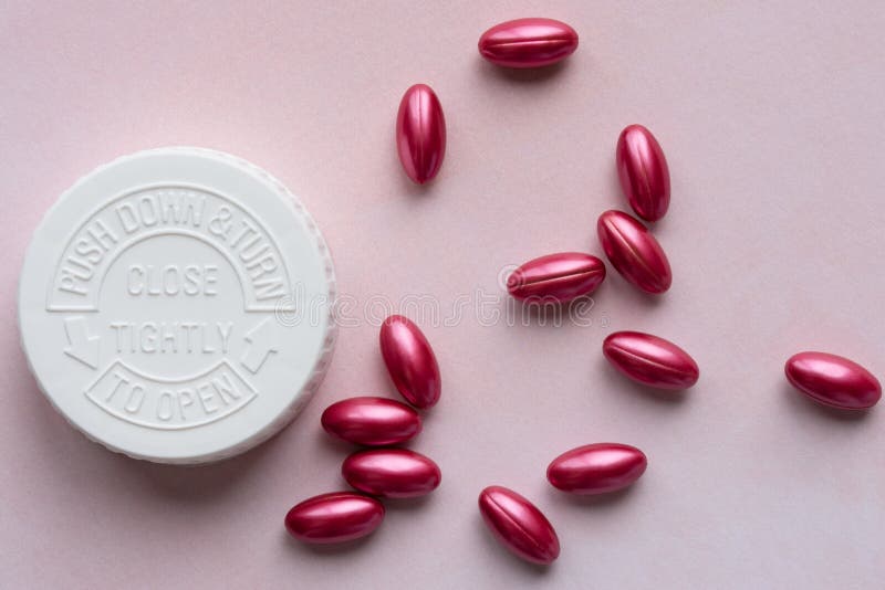 Collagen Capsules and a Bottle Cap Stock Photo - Image of pink, vitamin ...