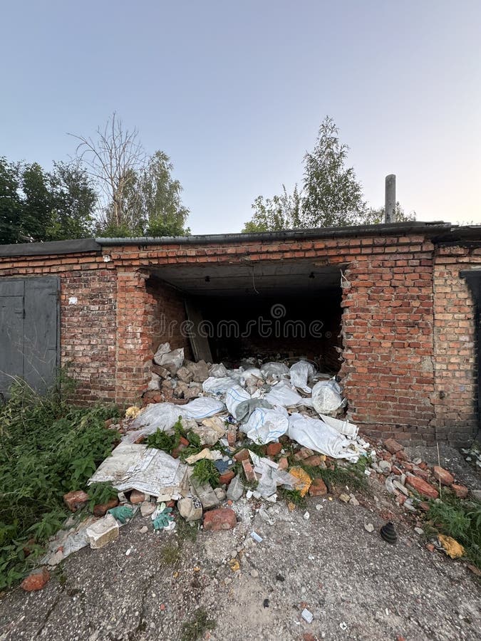 Collapsed Brick Garage Filled with Construction Waste and Debris Stock ...