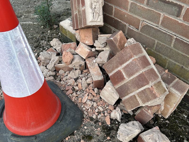 Collapsed Brick Wall, Brick Rubble Visible with Traffic Cone Stock ...