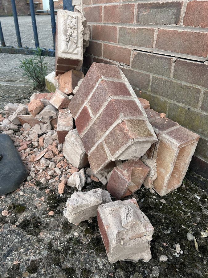 Collapsed Brick Wall, Brick Rubble Visible with Traffic Cone, Stock ...