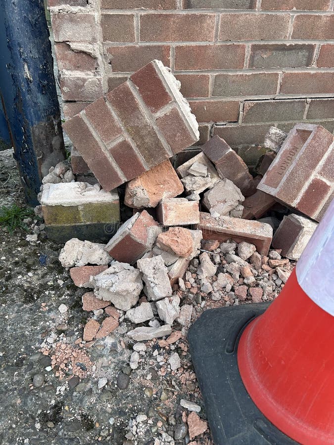 Collapsed Brick Wall, Brick Rubble Visible with Traffic Cone Stock ...