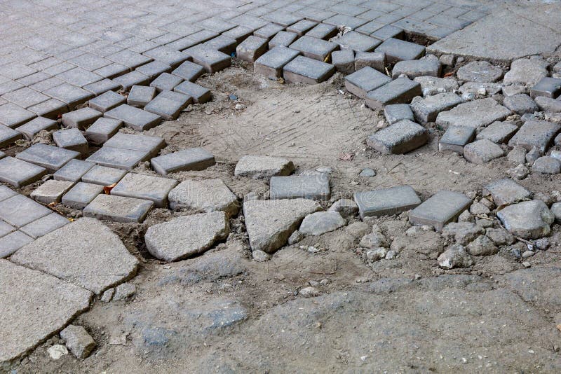 Collapsing Pedestrian Pavement Made of Paving Slabs. Background or ...