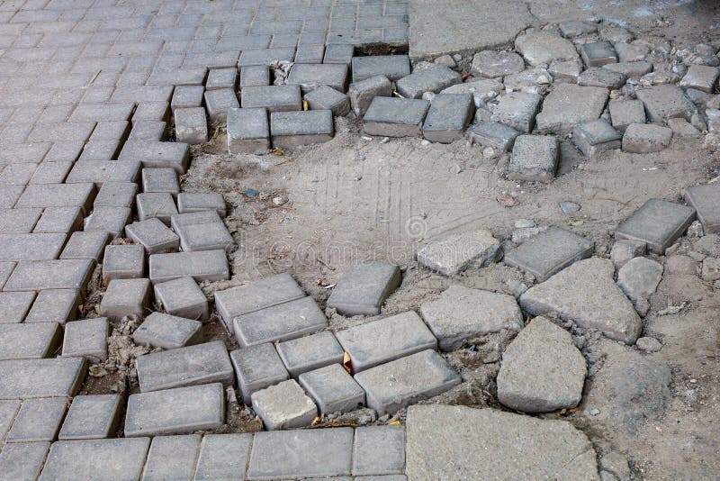 Collapsing Pedestrian Pavement Made of Paving Slabs. Background or ...