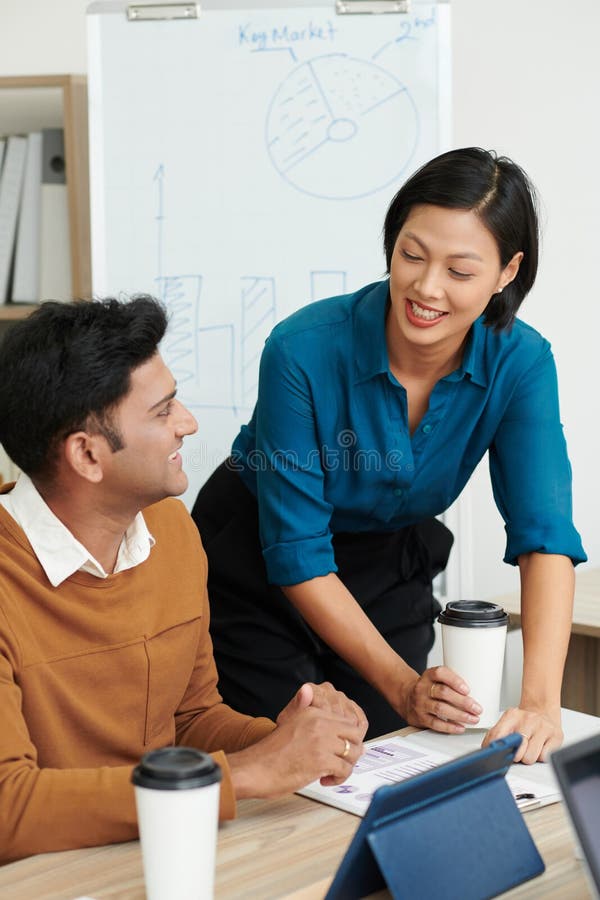 Colleague Working with Documents Together Stock Image - Image of ...