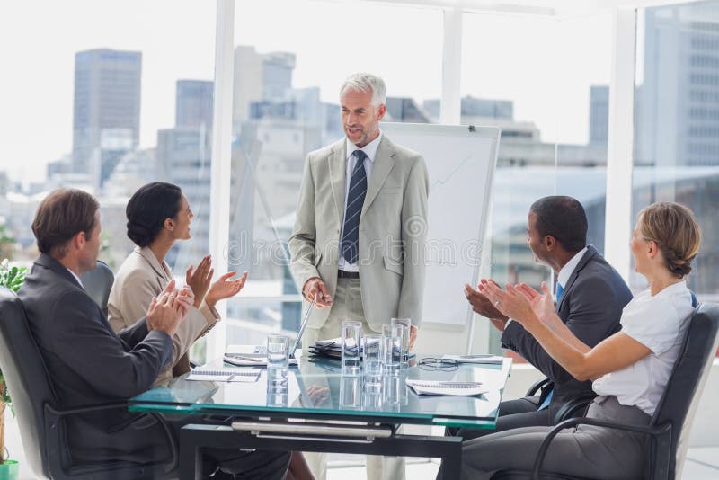 Colleagues Applauding the Boss during a Meeting Stock Image - Image of ...