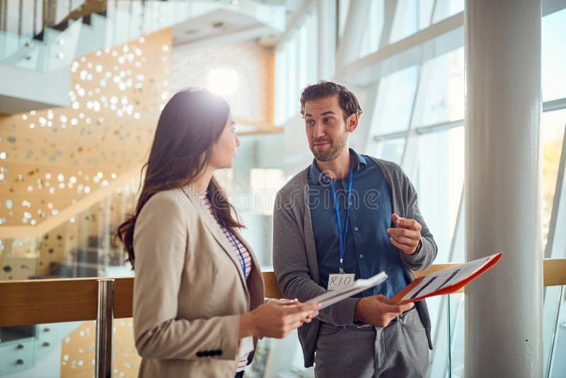 Colleagues are Chatting while Working at Work Together Stock Photo ...